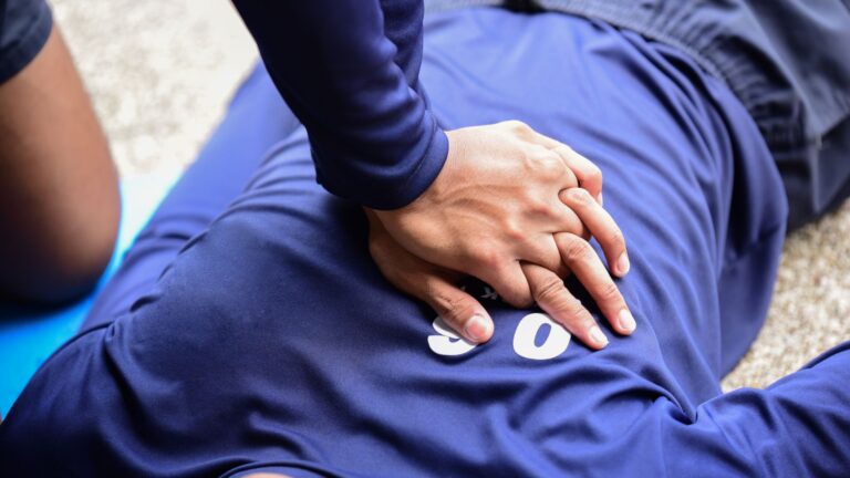 Who is responsible for performing CPR in a medical emergency?